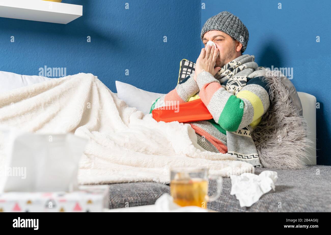 Man suffering from cold flu hi-res stock photography and images - Alamy
