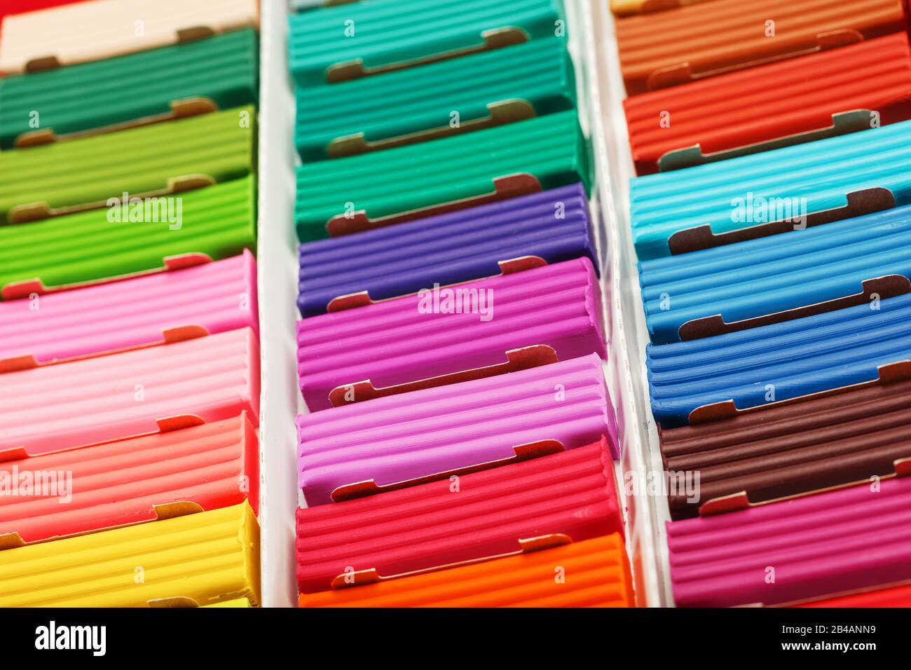 Plasticine in a box of multi-colored pieces in full screen, material ...