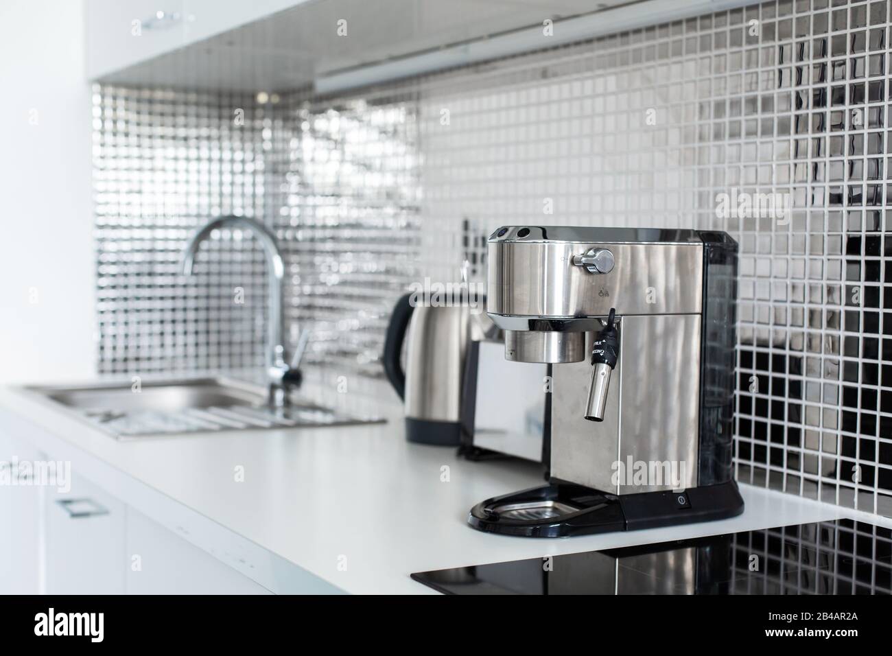 Stylish chrome kitchen interior. a Stock Photo - Alamy