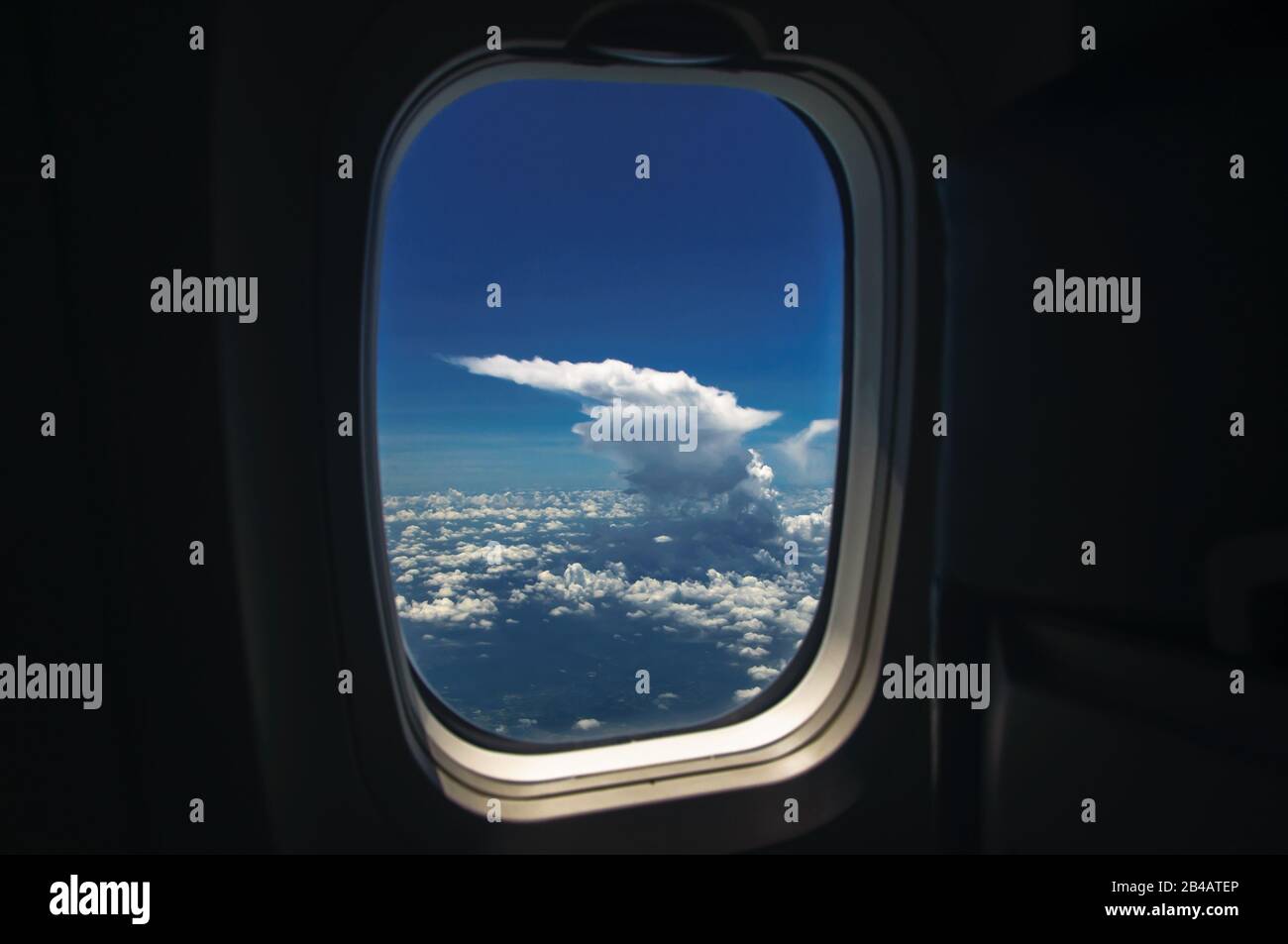 View of clouds from an airplane window Stock Photo - Alamy