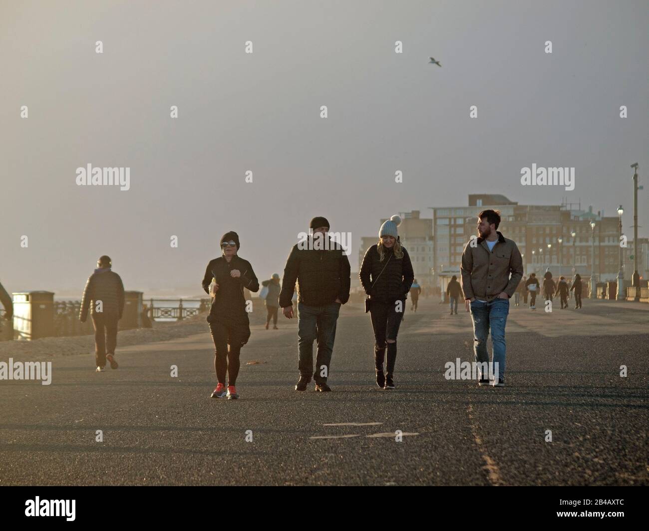 Taking a walk along the Hove promenade, Brighton Stock Photo - Alamy