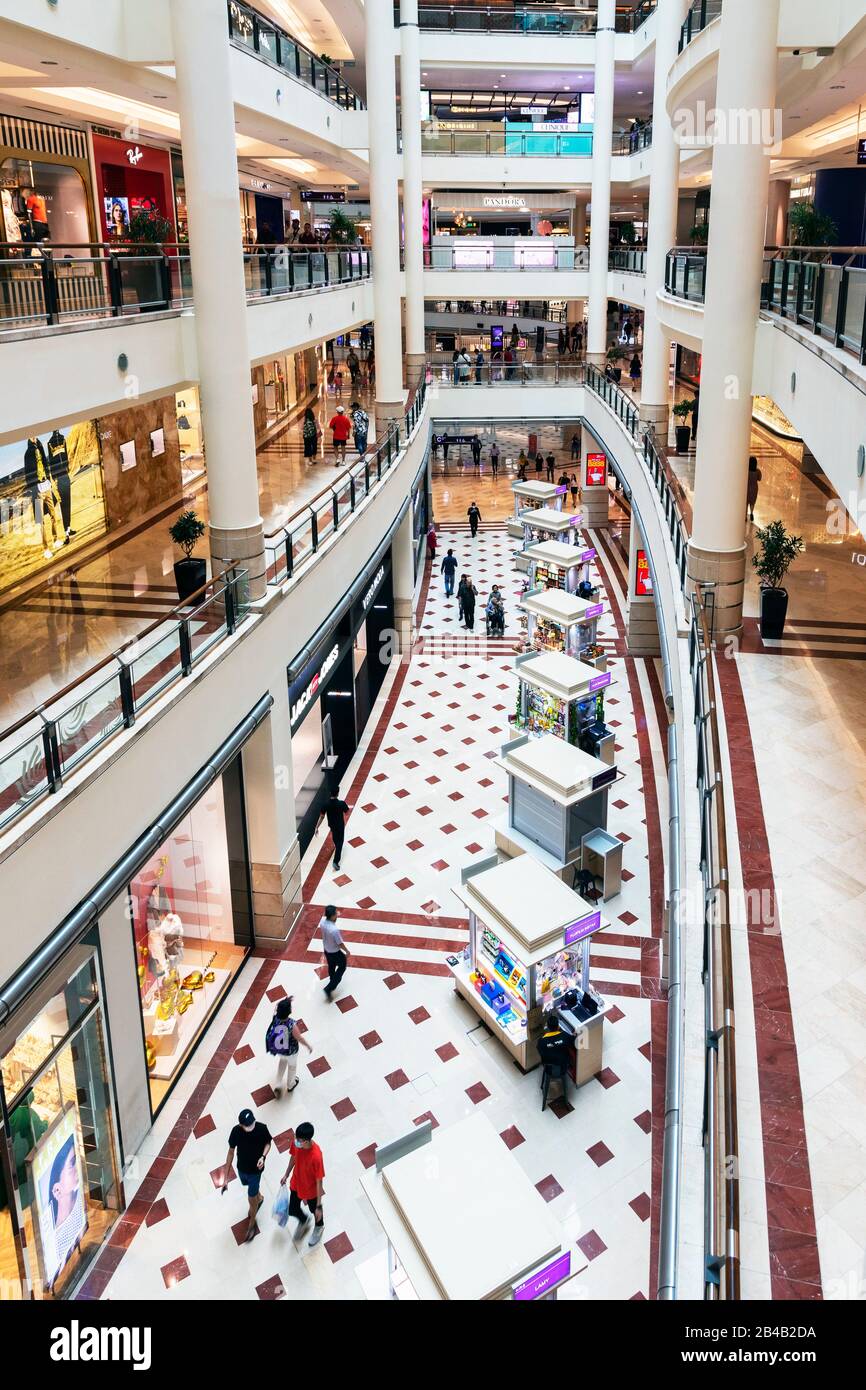 Interior of the Suria llcc large shopping mall at Petronas Towers ...
