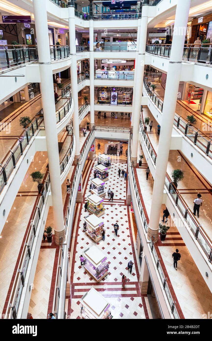 Interior of the Suria llcc large shopping mall at Petronas Towers ...
