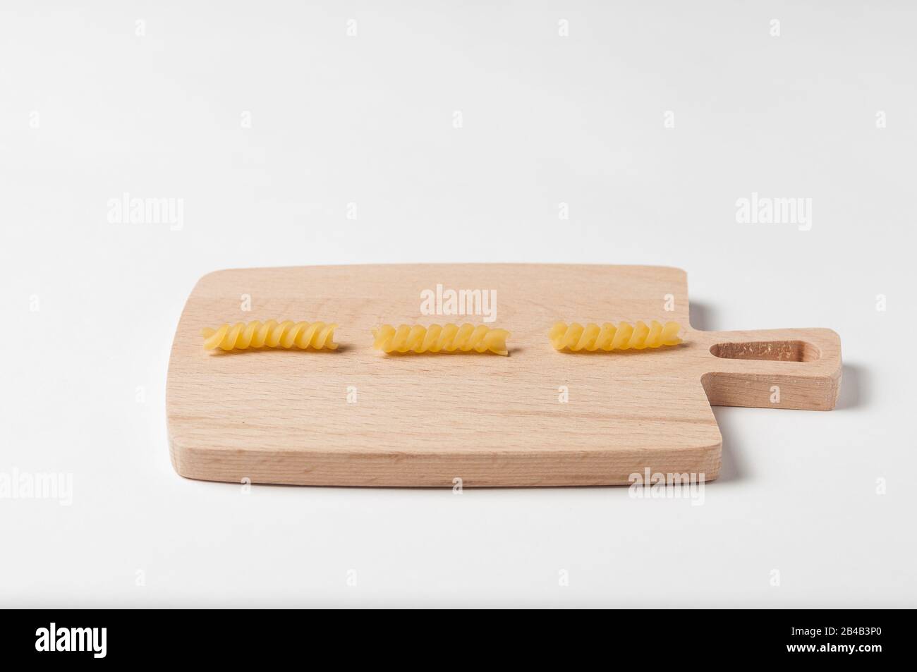 Italian food. One of the tipe of Italian pasta on a wooden board Stock ...