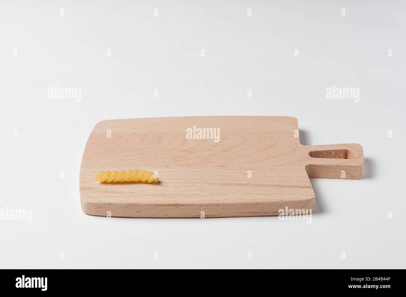 Italian food. One of the tipe of Italian pasta on a wooden board Stock ...