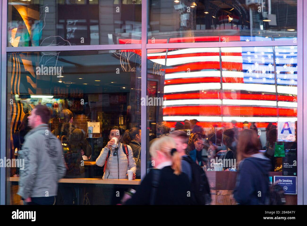 United States, New York, Manhattan, Times Square and the American flag ...