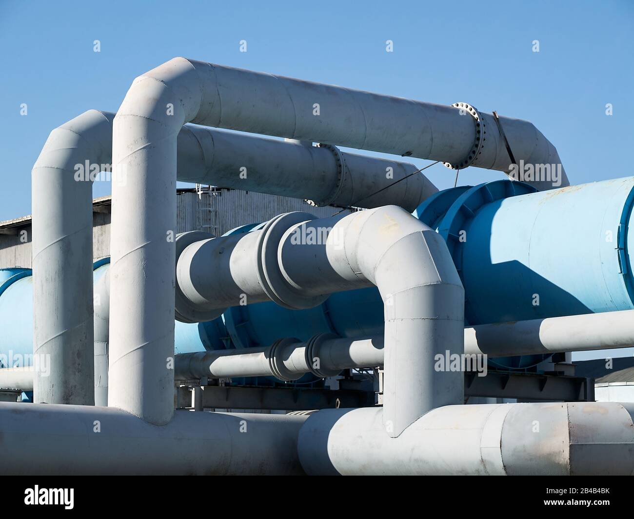 Tangle of pipes. Concept of complexity of petrochemical industry ...