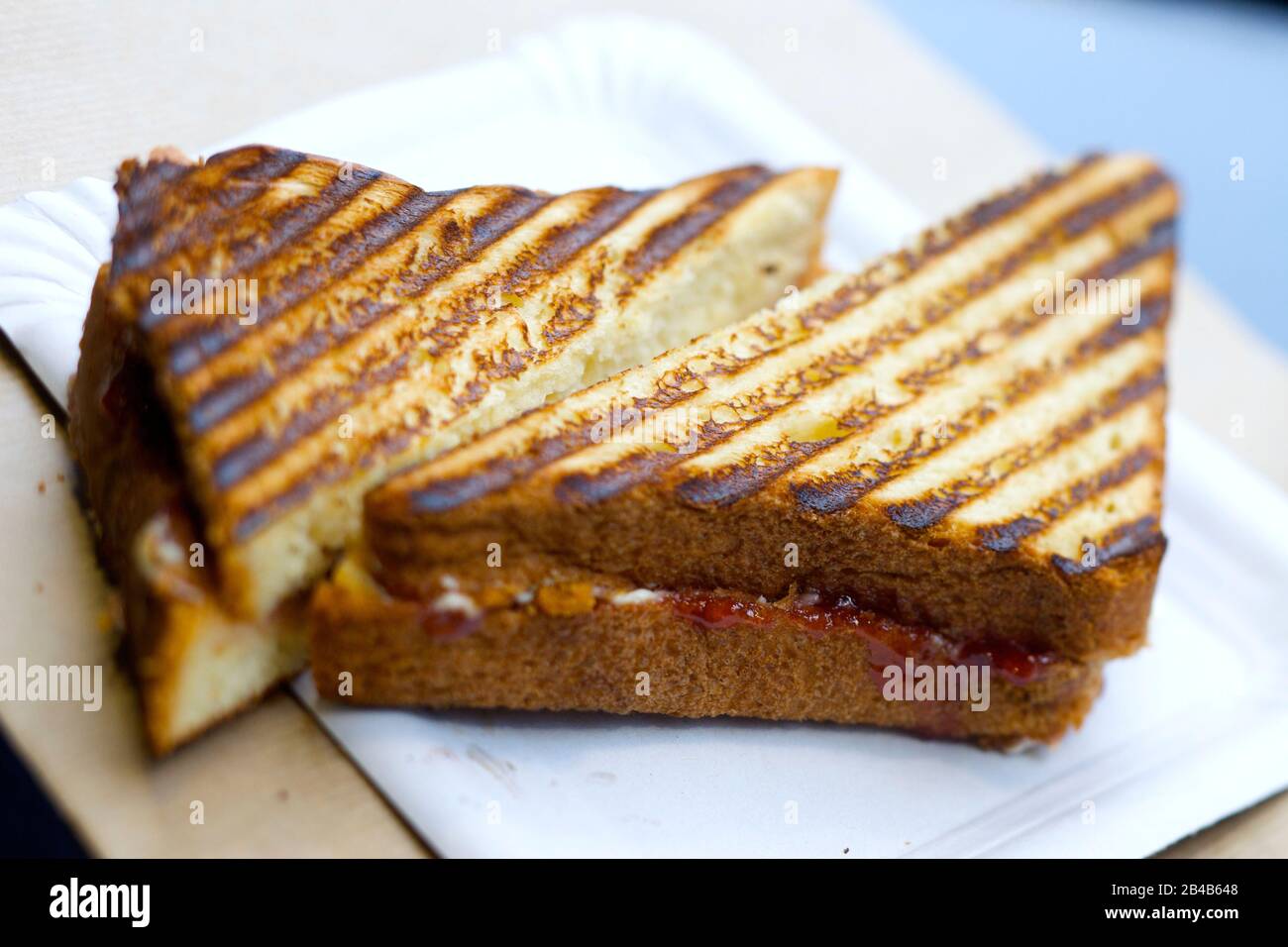 France, Paris, Maison du croque making Croque René, speculos strawberry ...