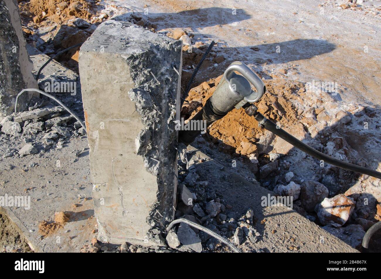 A large jackhammer during work. Demolition with a jackhammer Stock ...