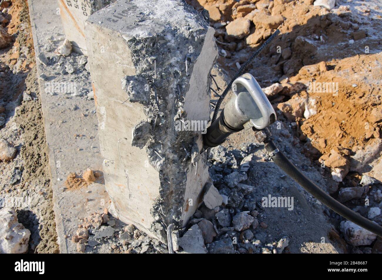 A large jackhammer during work. Demolition with a jackhammer Stock ...