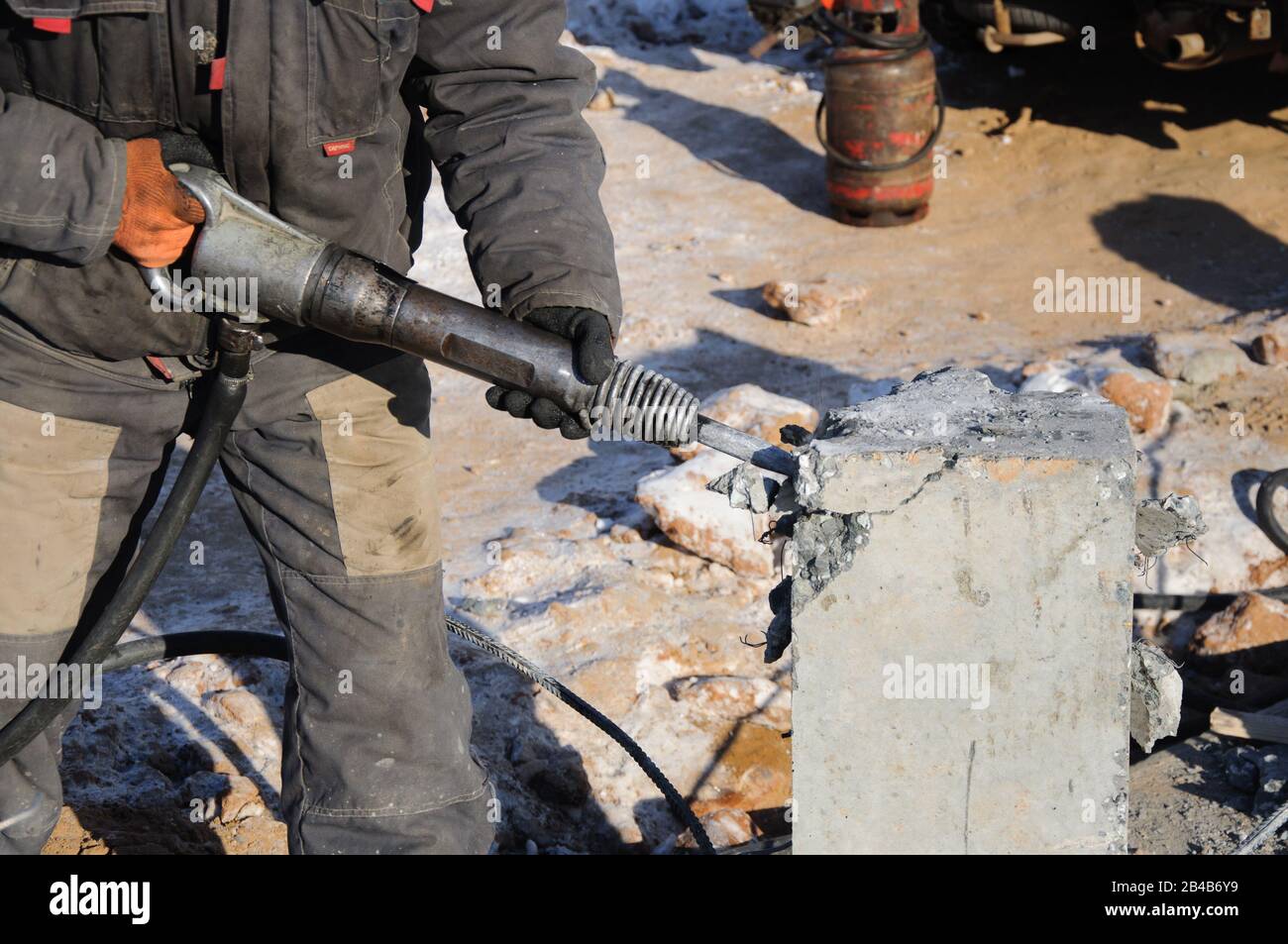A large jackhammer during work. Demolition with a jackhammer Stock ...