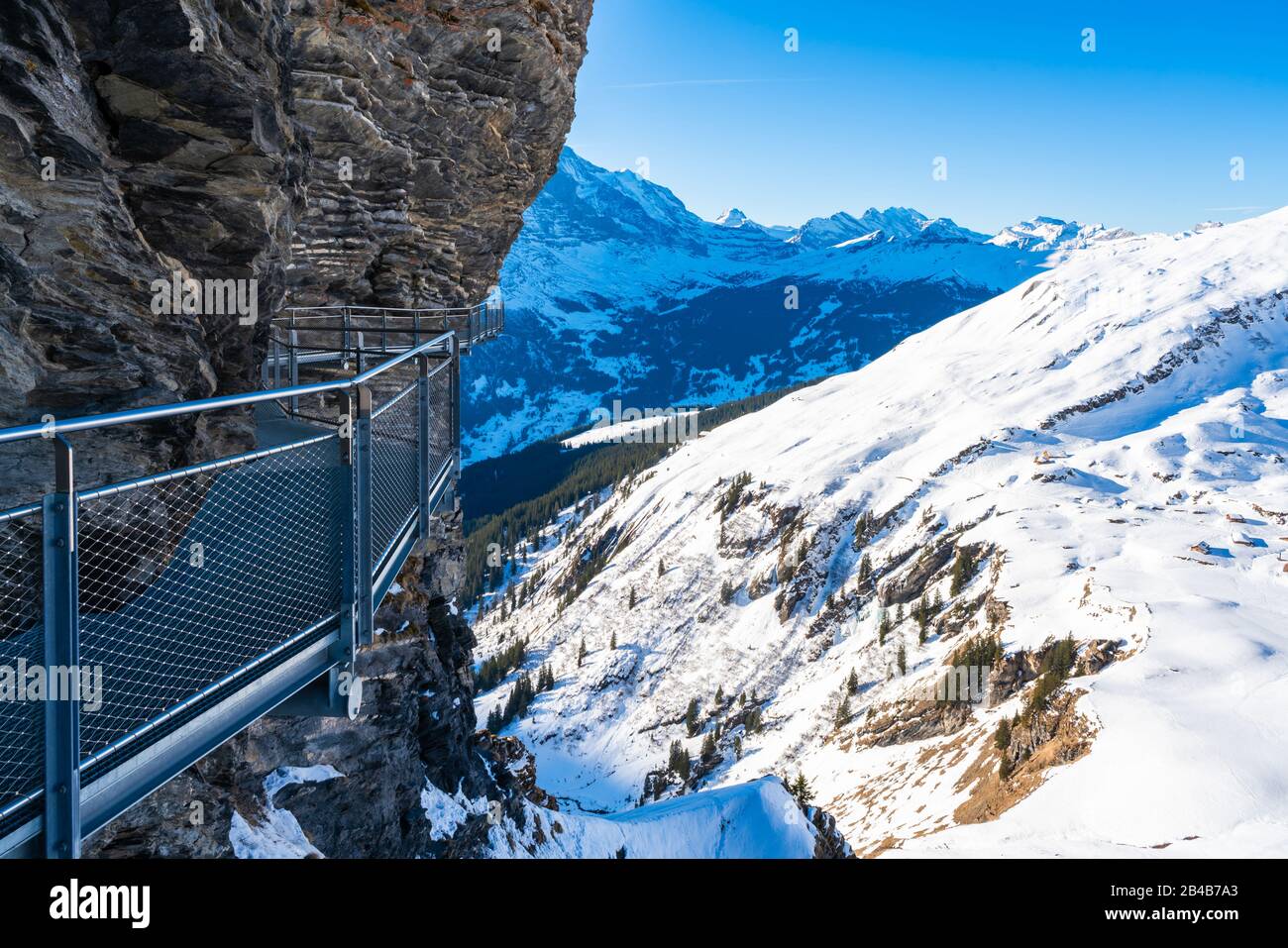 Metal bridge of the Cliff Walk on First mountain with spectacular view ...