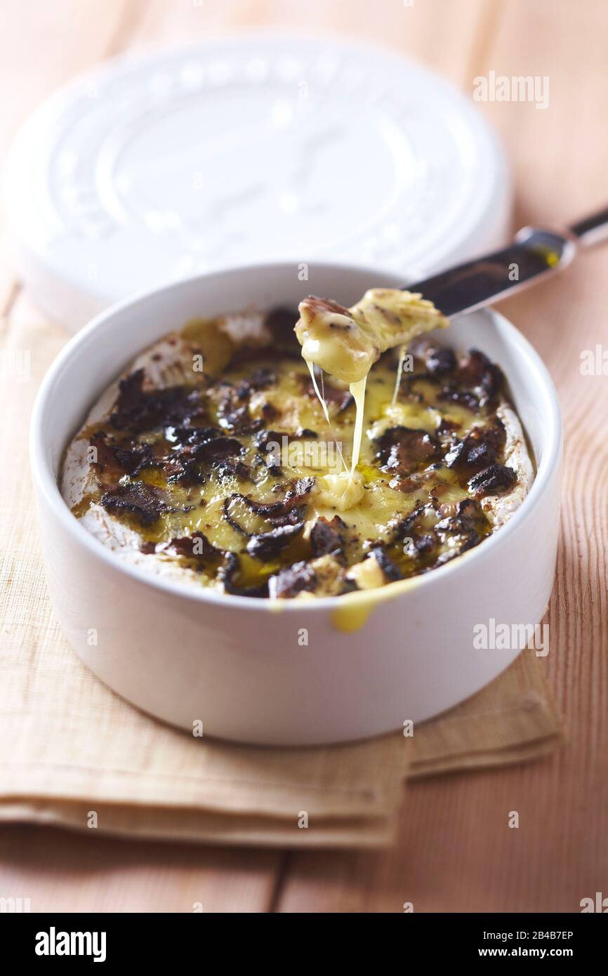 Melted cheese, truffle camembert Stock Photo - Alamy