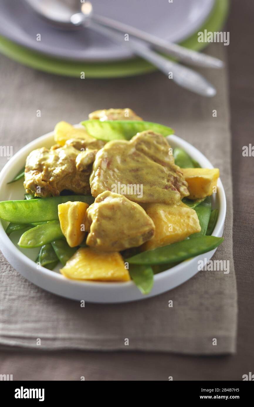 Stewed, mango lamb curry Stock Photo - Alamy
