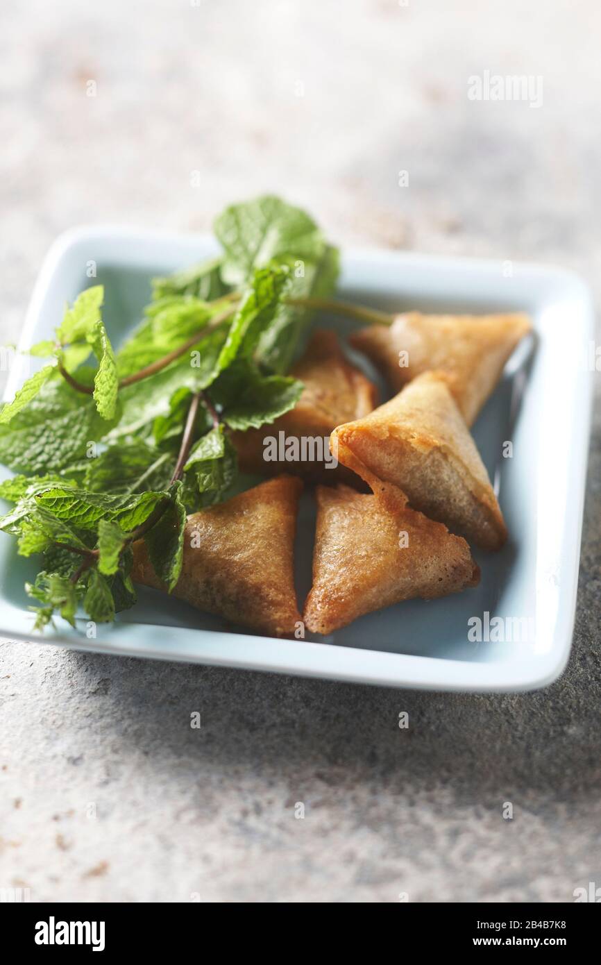 Crispy samosa with fresh cheese Stock Photo - Alamy