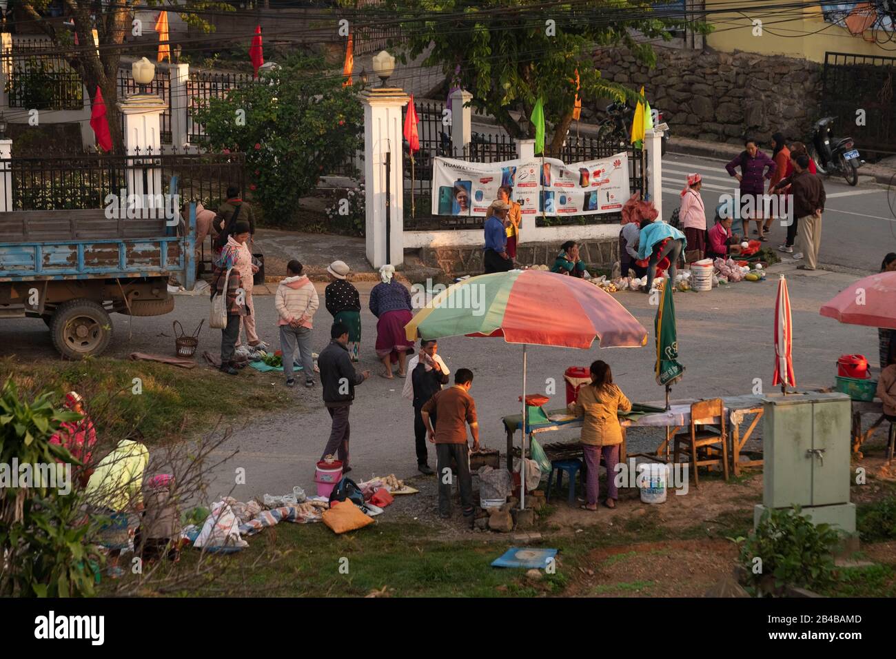 Laos, Phongsaly province, Phongsaly town, in a street early in the ...