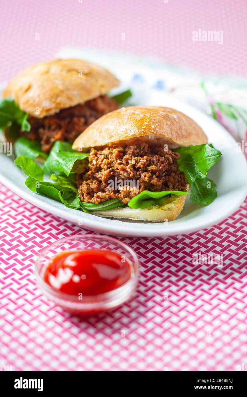Ketchup dish, marinated burger Stock Photo - Alamy