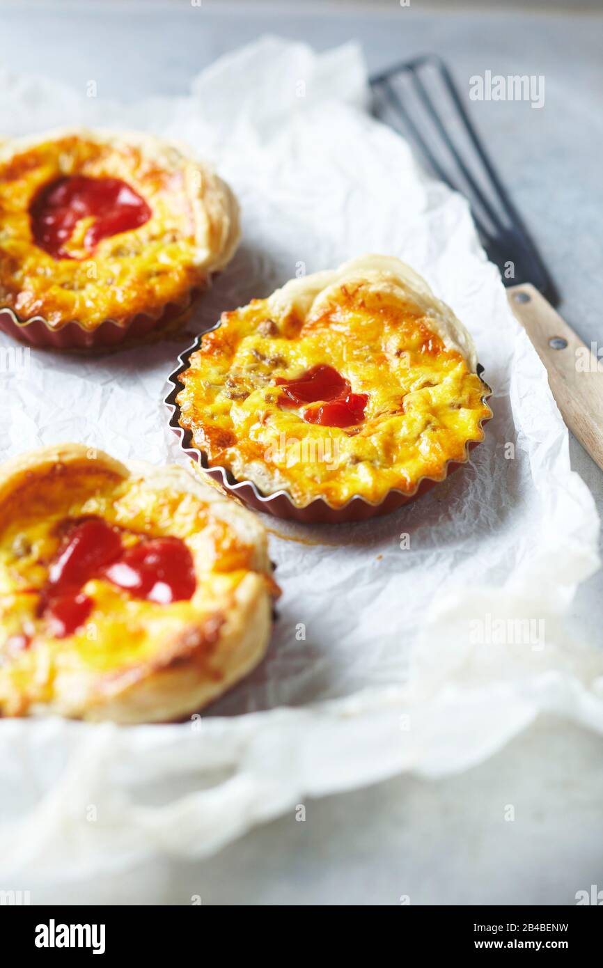 Ketchup dish, flaky meat pie Stock Photo - Alamy