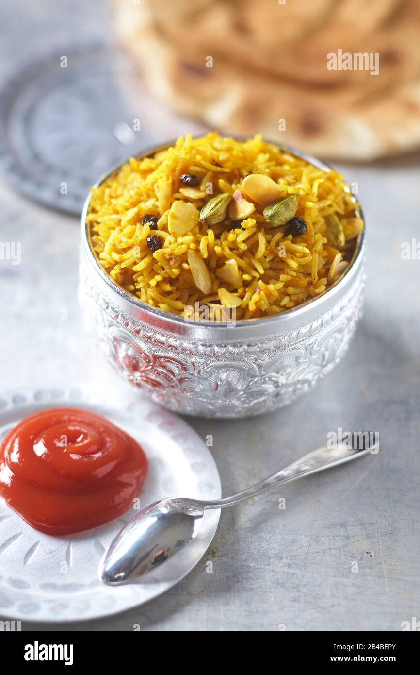 Ketchup dish, Indian rice Stock Photo - Alamy