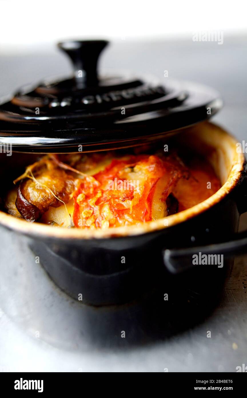 Rosemary monkfish moussaka Stock Photo - Alamy