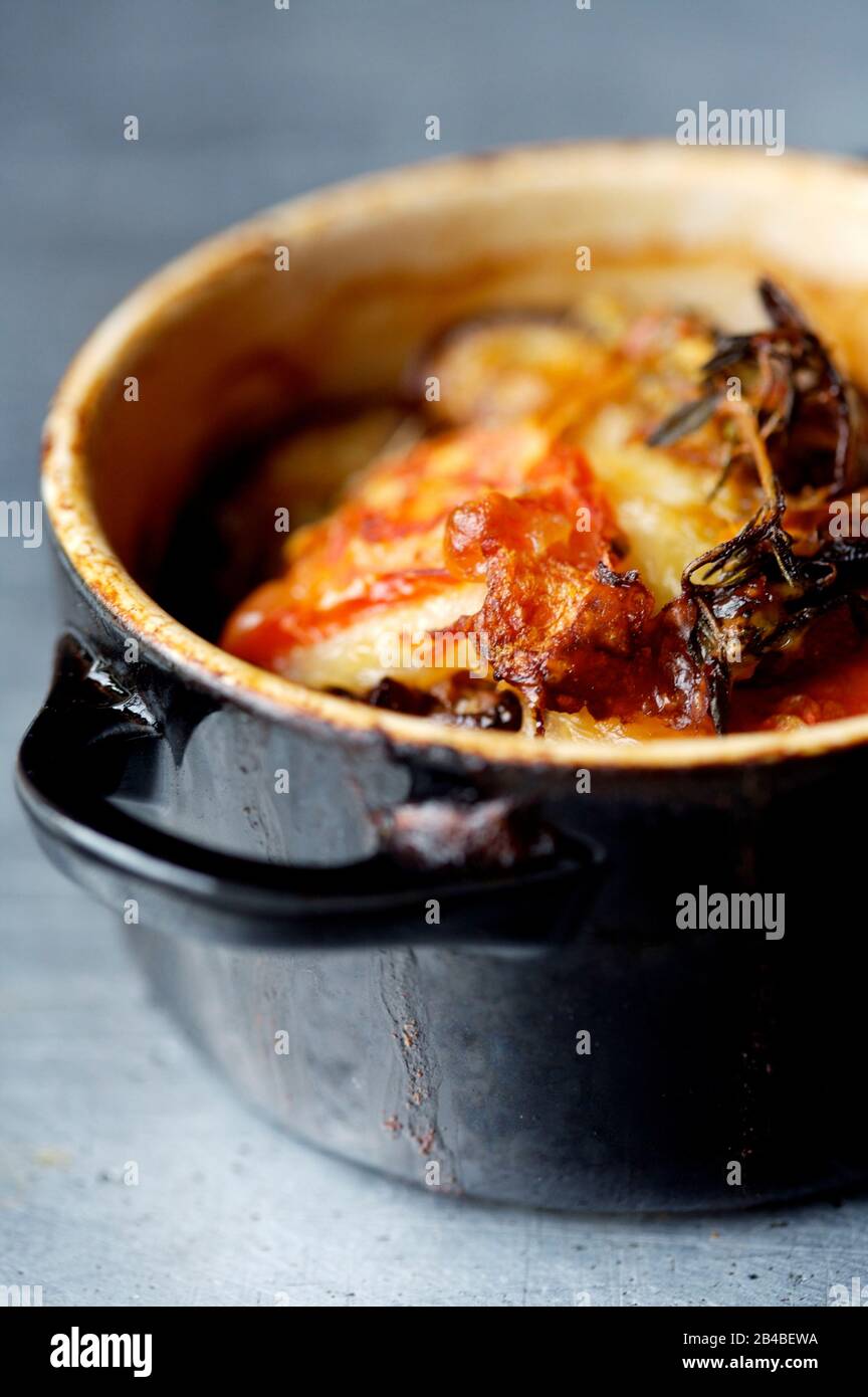Rosemary monkfish moussaka Stock Photo - Alamy