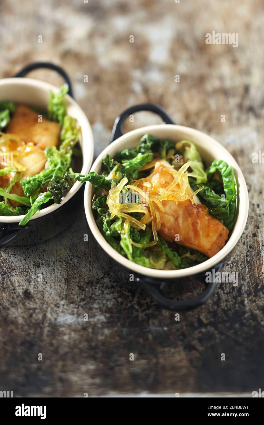 Casserole cod cabbage green orange Stock Photo - Alamy