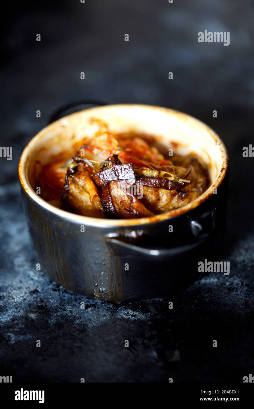 Rosemary monkfish moussaka Stock Photo - Alamy