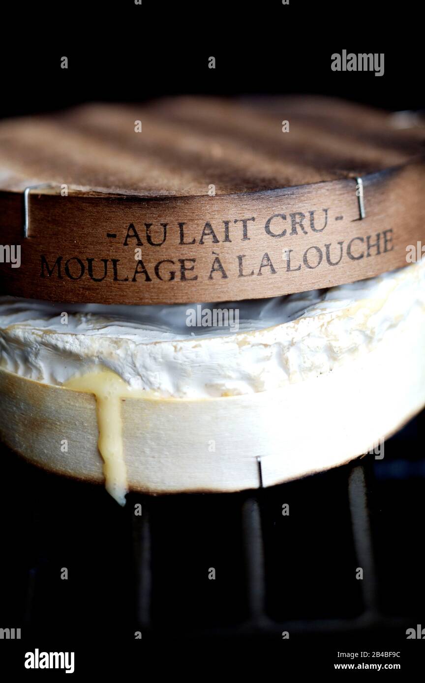 Camembert cooked in the box Stock Photo - Alamy