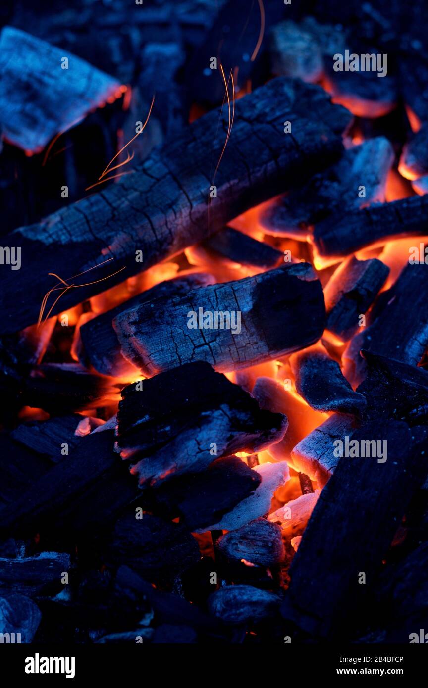 Preparation of embers Stock Photo - Alamy