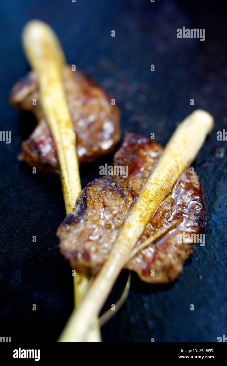 Plancha cooking, marinated beef brochette with lemongrass Stock Photo ...