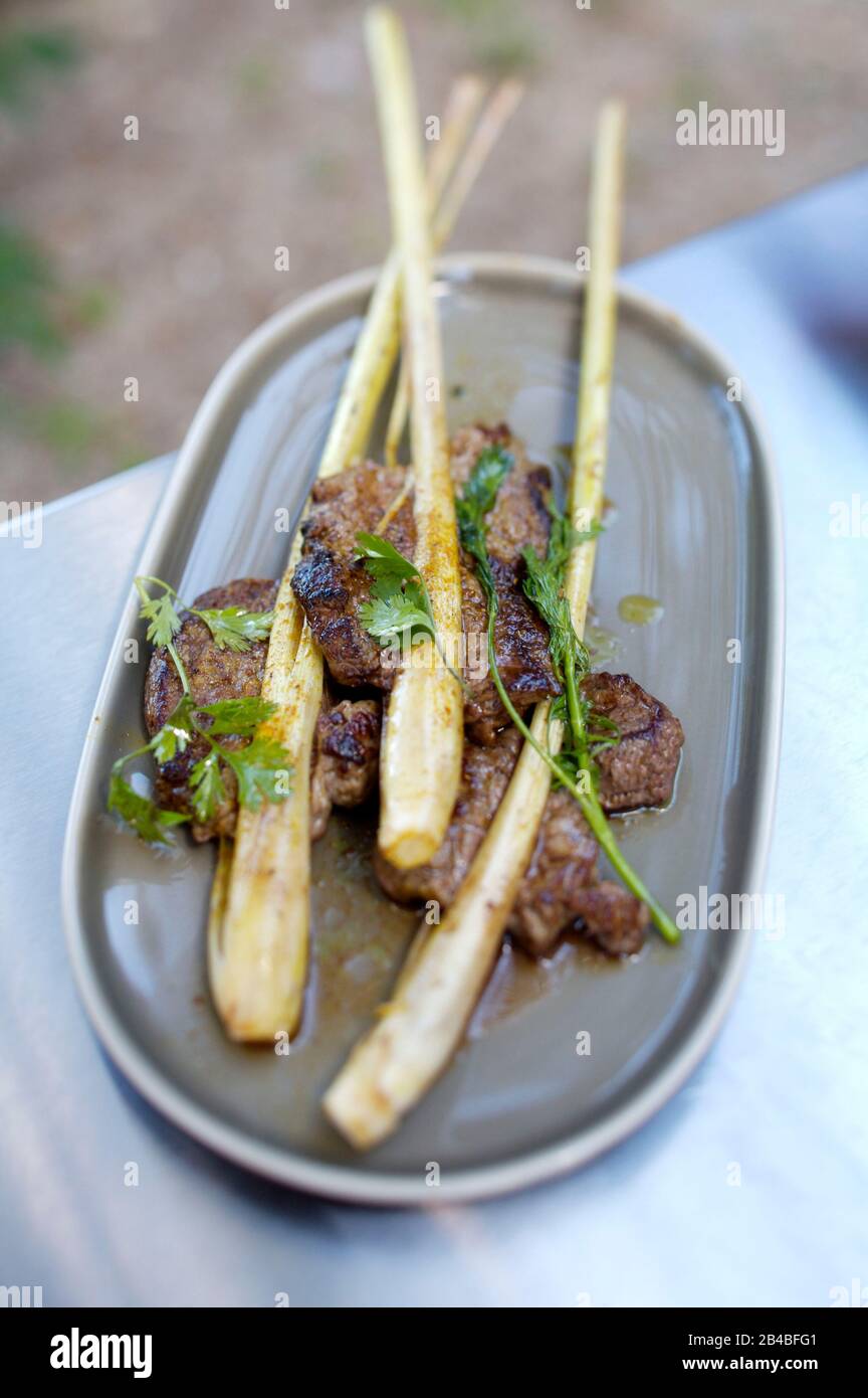 Plancha cooking, marinated beef brochette with lemongrass Stock Photo ...