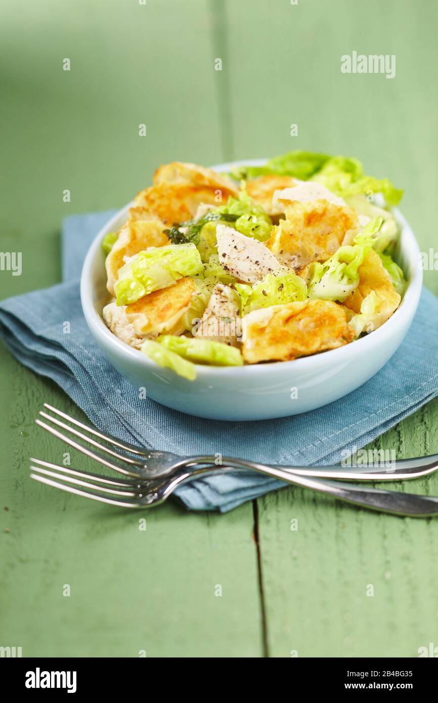 Kiri dish, chicken salad and Babybel crisps Stock Photo - Alamy