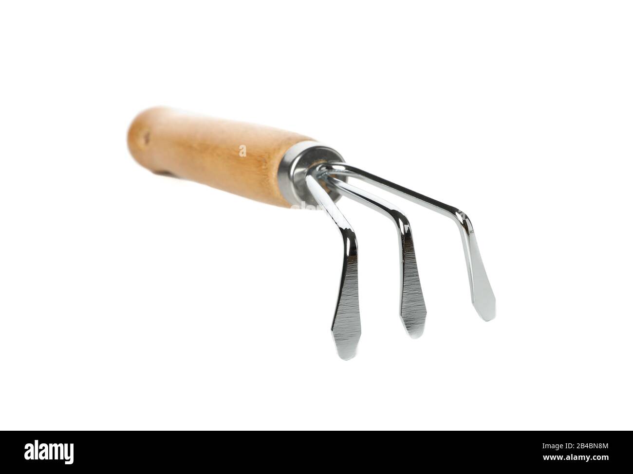 Small garden rake isolated on white background Stock Photo - Alamy