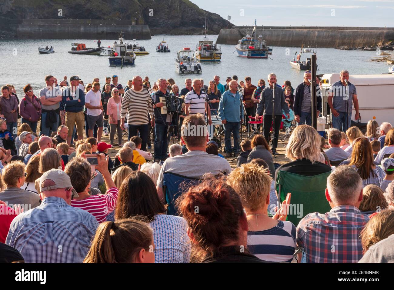 United Kingdom, England, Cornwall, Port Isaac, Crowd on the Platt ...