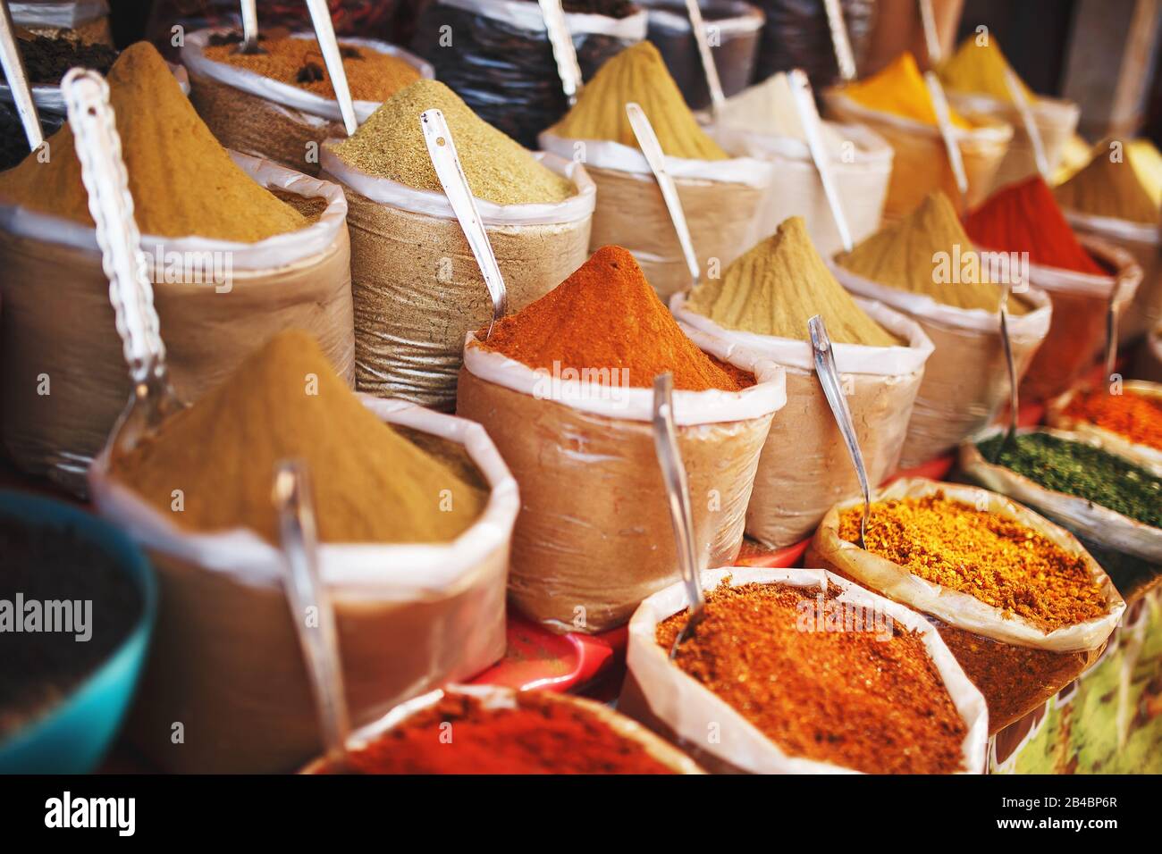 Indian colored spices at local market. A variety of spices of different ...