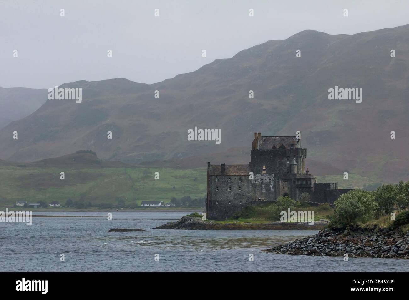 Old castle at a lake, Eilean Donan Castle, Scottish countryside Stock ...