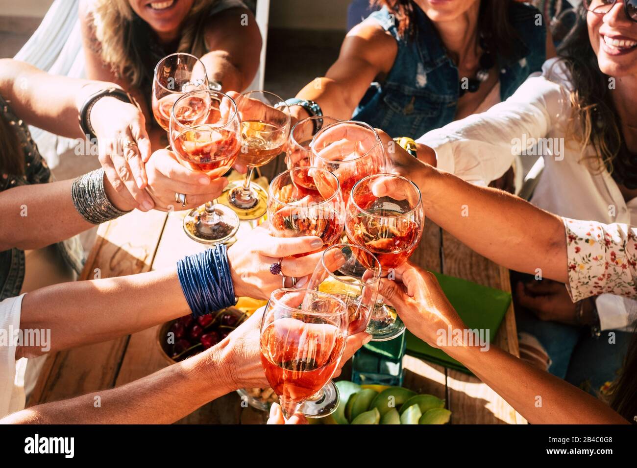 Happy and cheerful group of people females young friends together ...