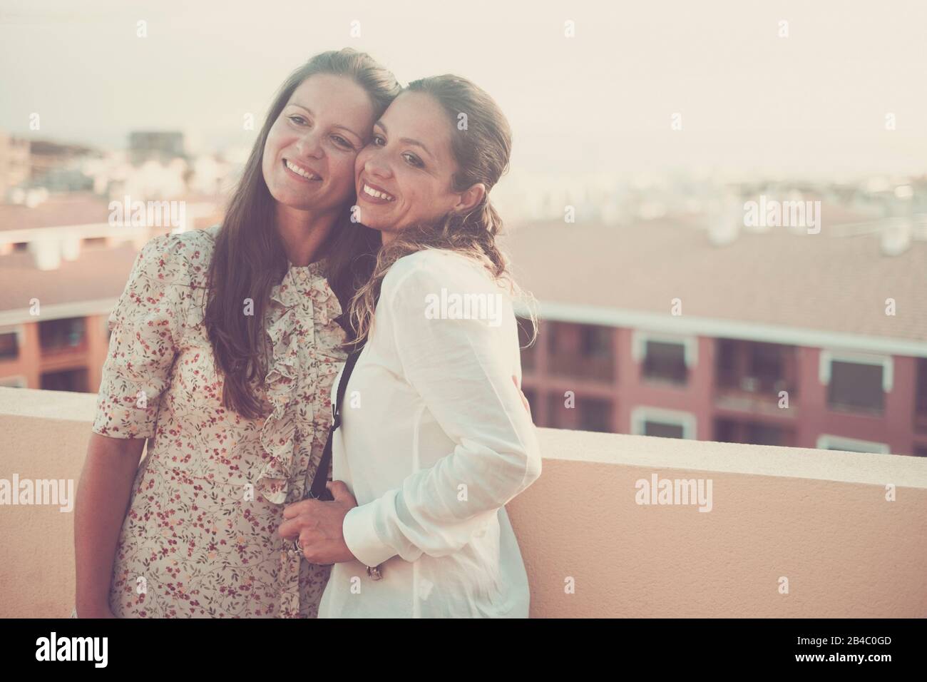 Couple of women happy friends smile and have fun laughing a lot ...