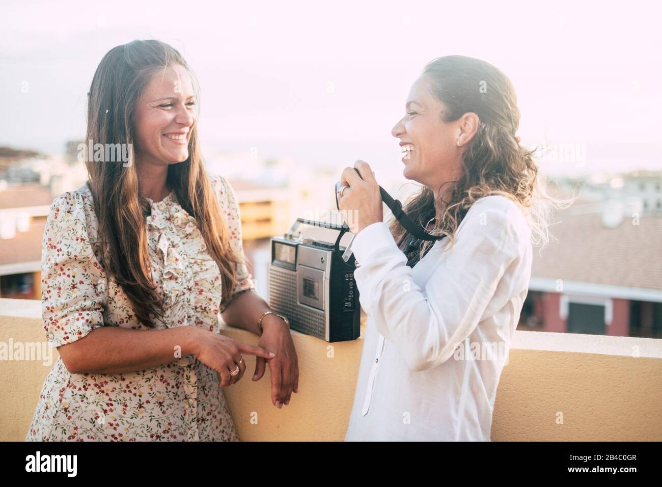 Couple of women happy friends smile and have fun laughing a lot ...
