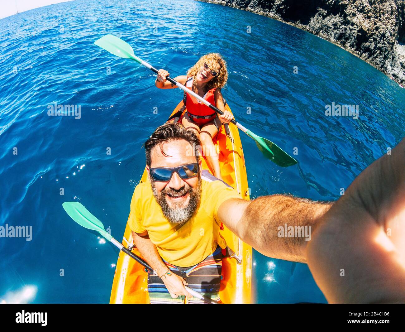 Selfie couple with top vertical point of view - happy active adult ...