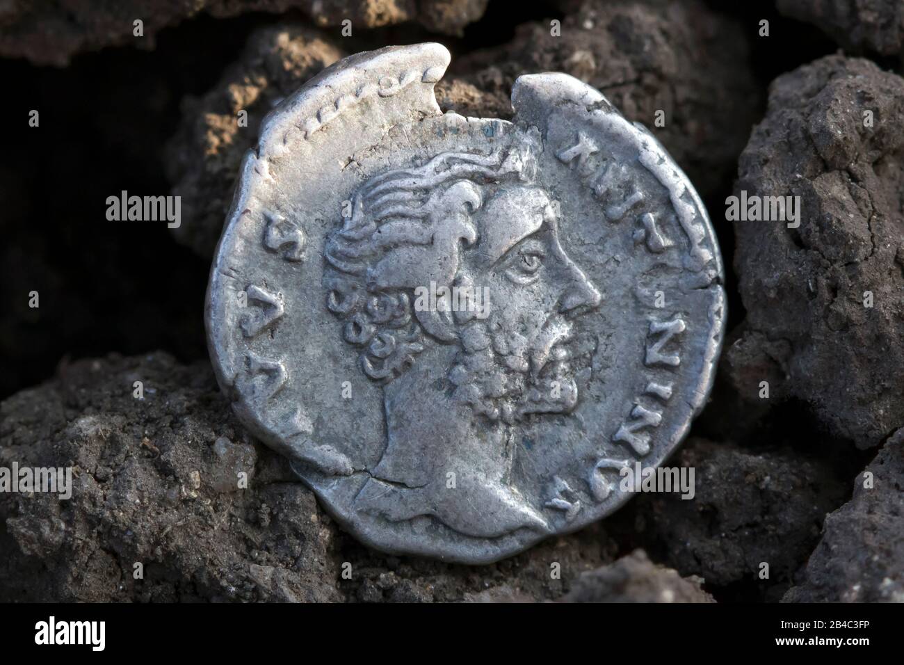 Ancient Roman silver coin showing the portrait of the emperor Stock ...