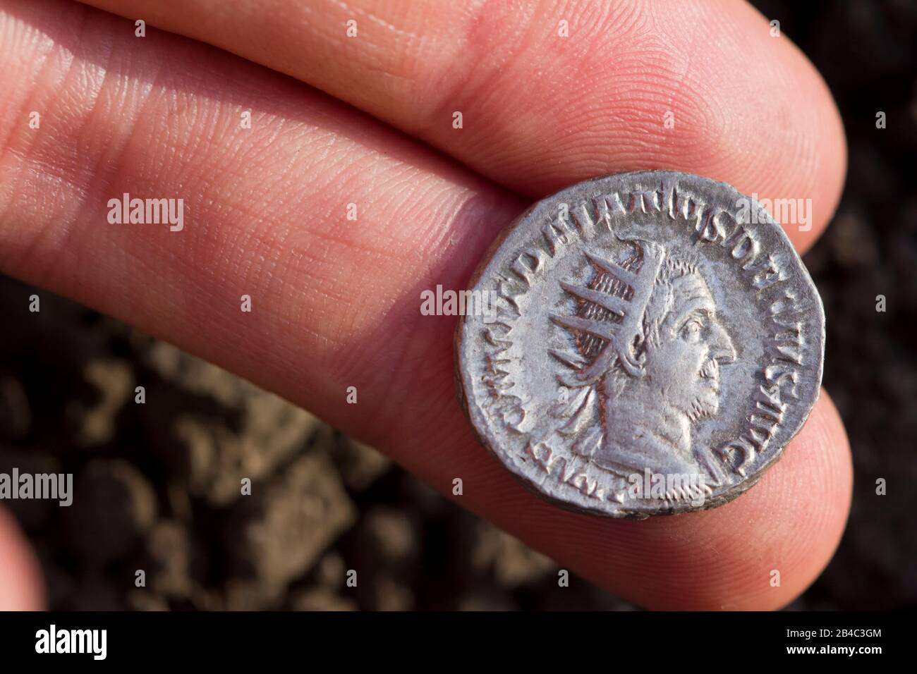 Ancient Roman silver coin showing the portrait of the emperor Stock ...
