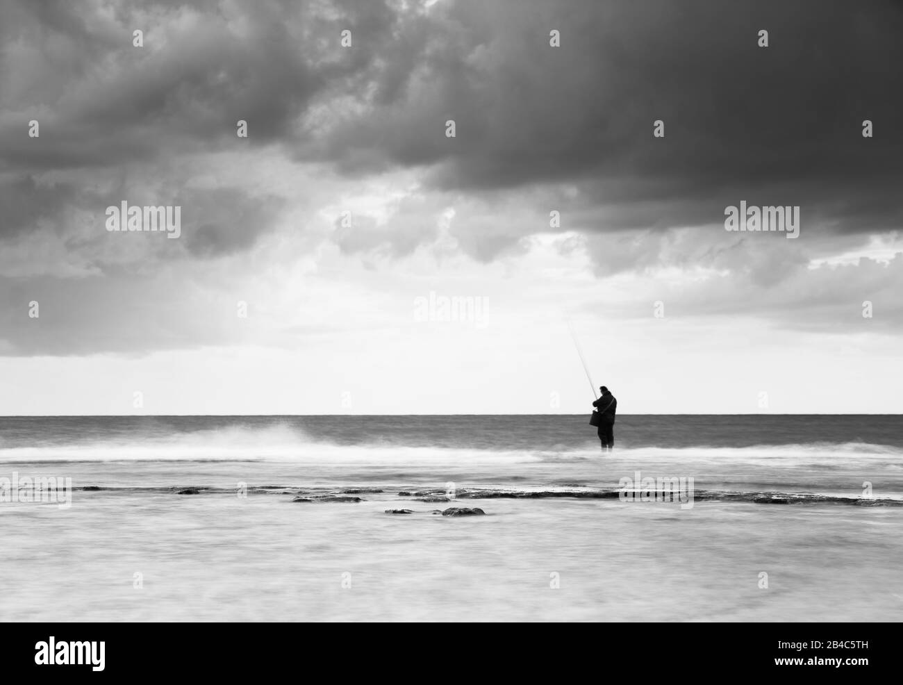 Clouds and wind storm weather and man Stock Photo - Alamy