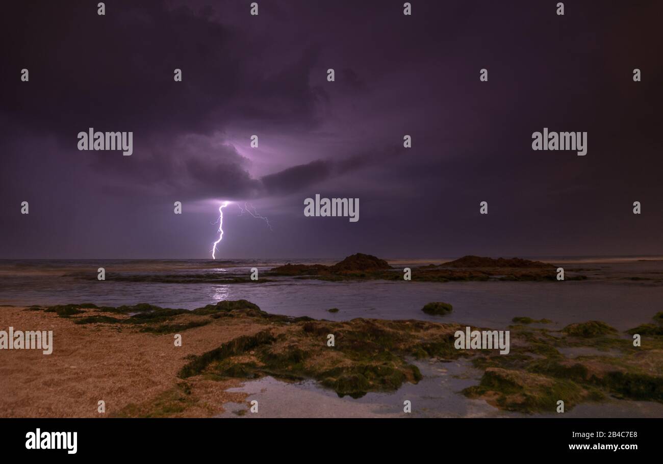 Lightning, heavy clouds and rain stormy weather Stock Photo - Alamy