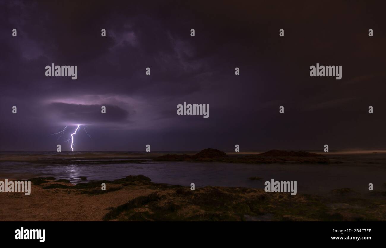 Lightning, heavy clouds and rain stormy weather Stock Photo - Alamy