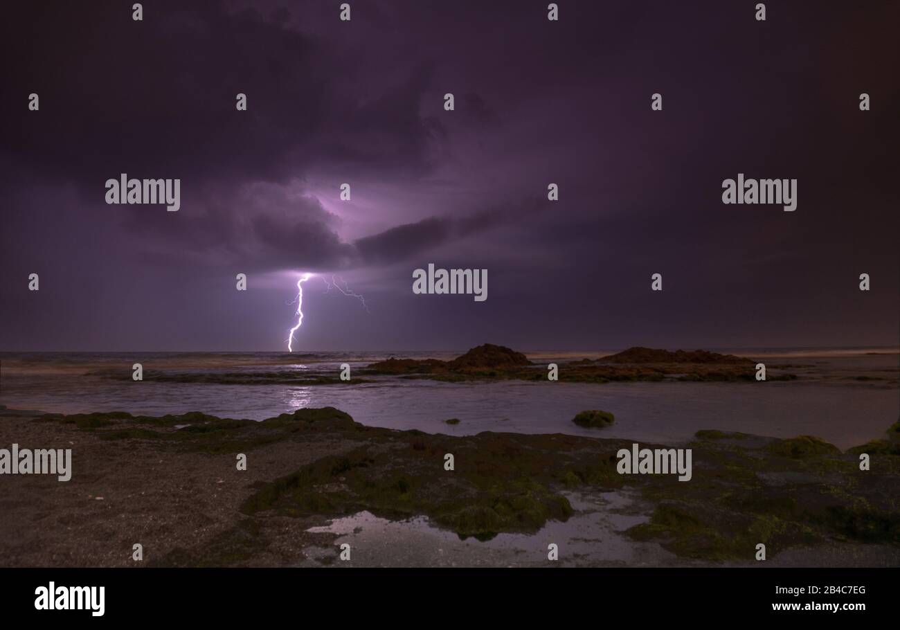 Lightning, heavy clouds and rain stormy weather Stock Photo - Alamy