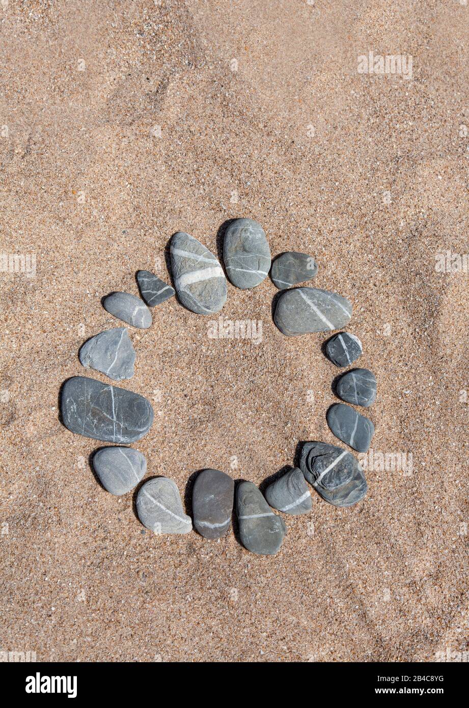 Zen Land Art style circle created from pebble with a white line Stock ...