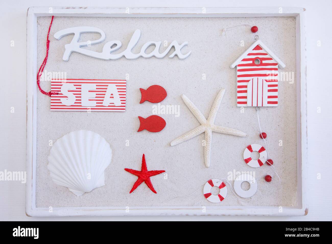 red and white maritime still life with natural and decoration objects ...