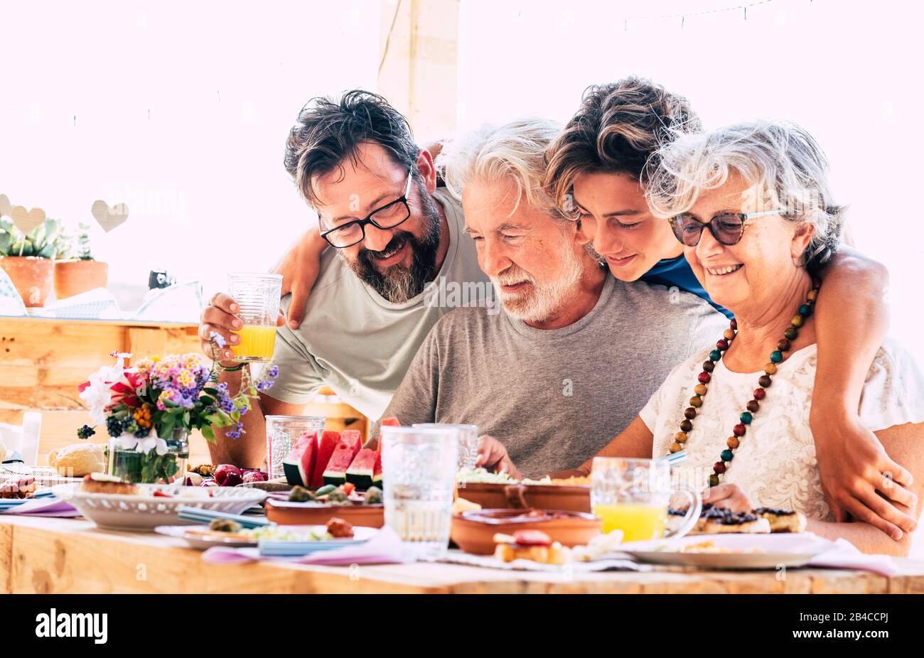 Family group of people with mixed generation have fun together at ...