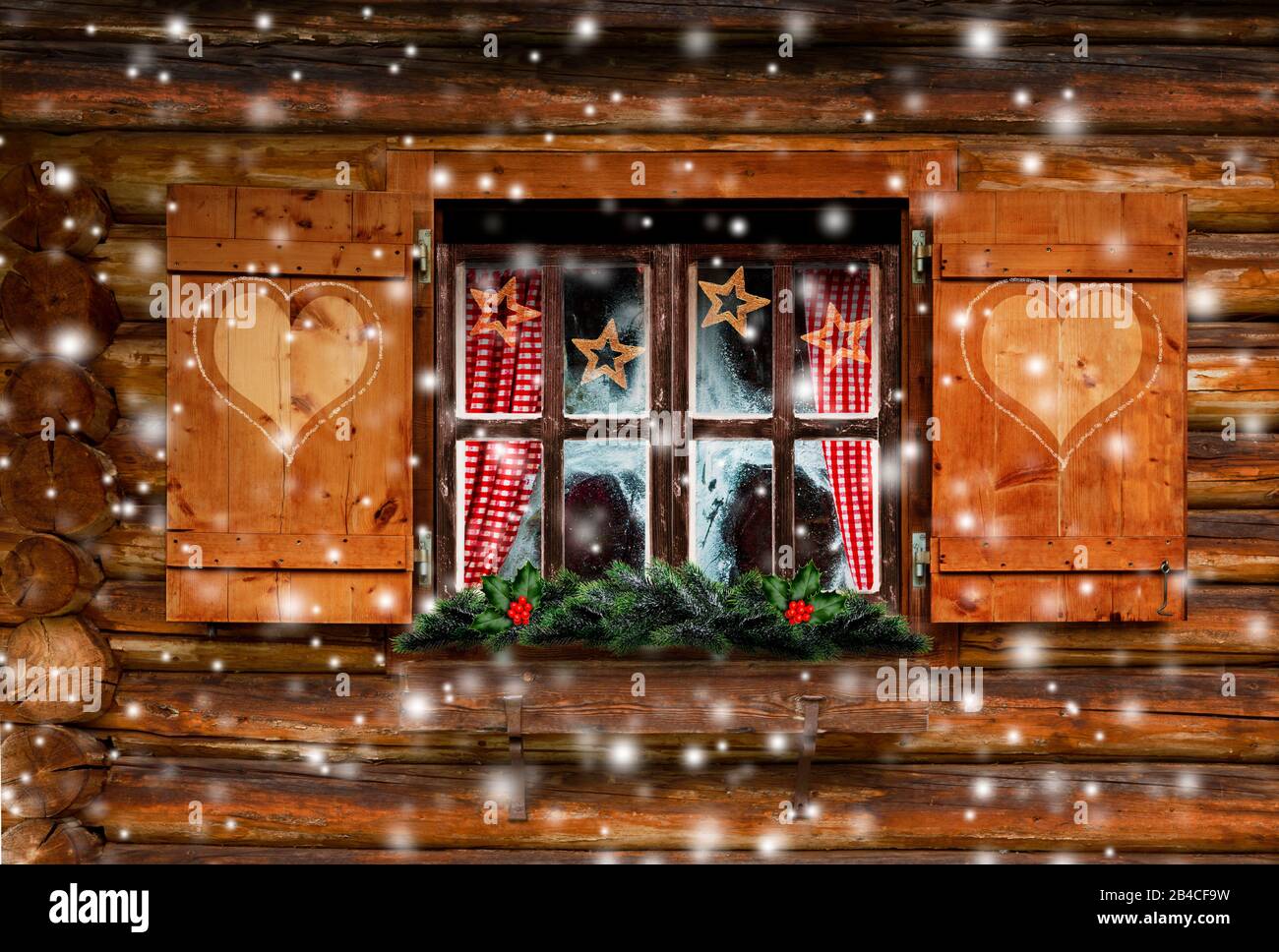 Christmas window with red curtain and ice crystals Stock Photo - Alamy